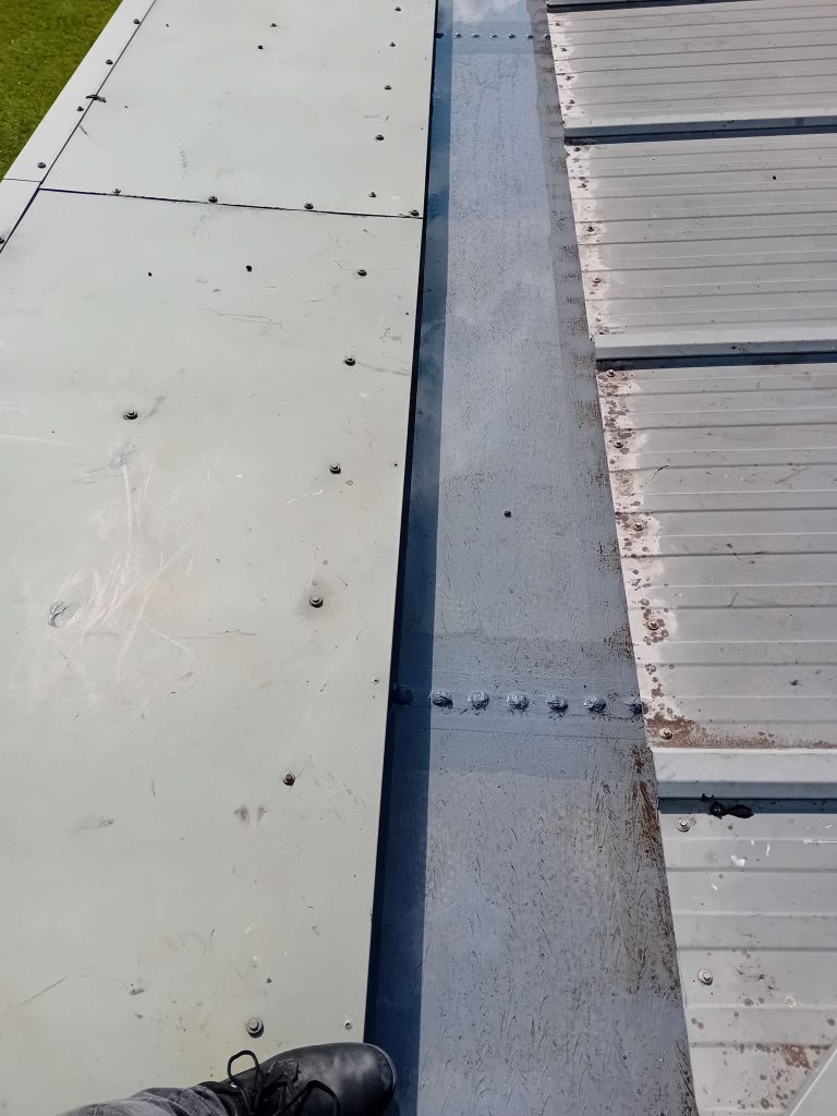 Gutter System Coating in Coalville - Roof Recoating Case Study
